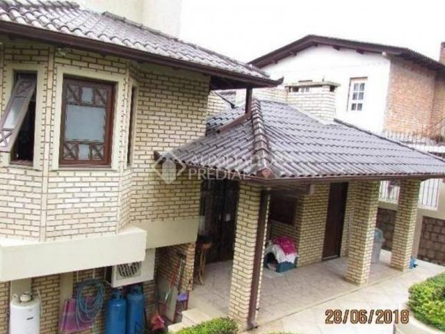 CASA COM 03 QUARTOS, 01 SUÍTE, 02 VAGAS, CENTRO DE VIAMÃO RS