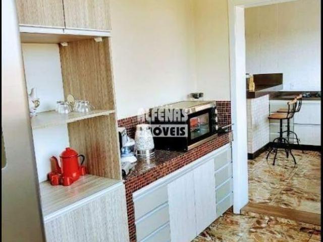 CASA COM 03 QUARTOS, 01 SUITE, 02 VAGAS DE GARAGEM BAIRRO SEVILHA EM RIBEIRAO DAS NEVES / MG
