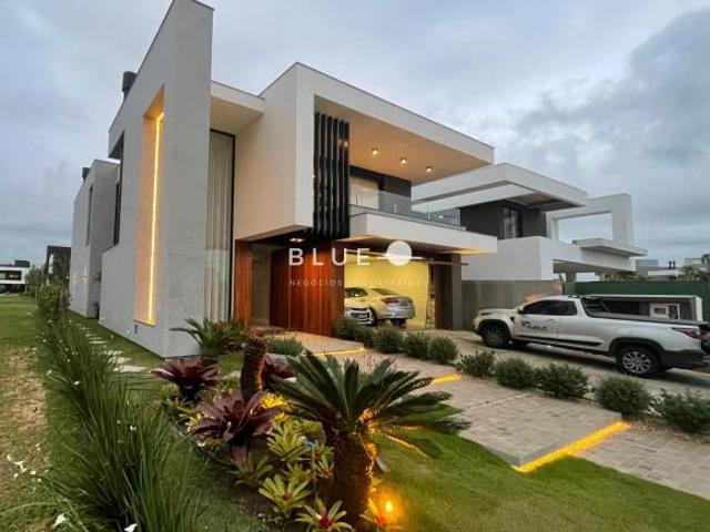 Casa com 03 suítes mobiliada no Reserva das águas Torres RS
