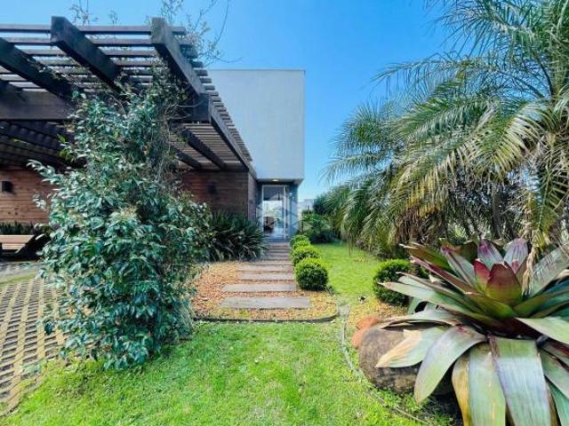 Casa com 03 súites, mobiliado no condomínio One Atlântida House na praia de Atlântida em Xangri Lá