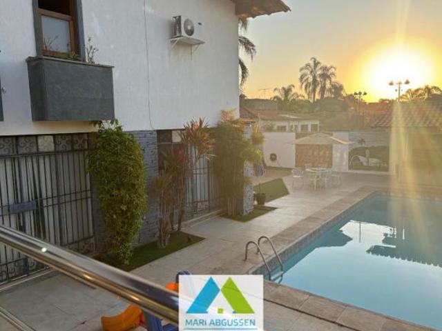 CASA COM 03 SUÍTES NO BAIRRO BANDEIRANTES, SALAS AMPLAS, 1.000 M² DE TERRENO, ÁREA DE LAZER COMPLETA