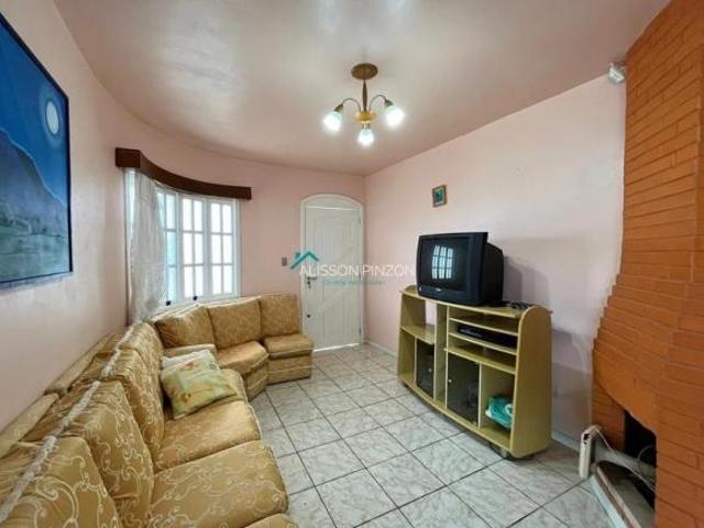 Casa com 02 terrenos próxima ao mar
