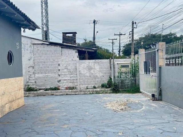 Casa com 151 m2, 4 quartos, garagem para 4 carros com churrasqueira Bairro Mathias Velho Canoas
