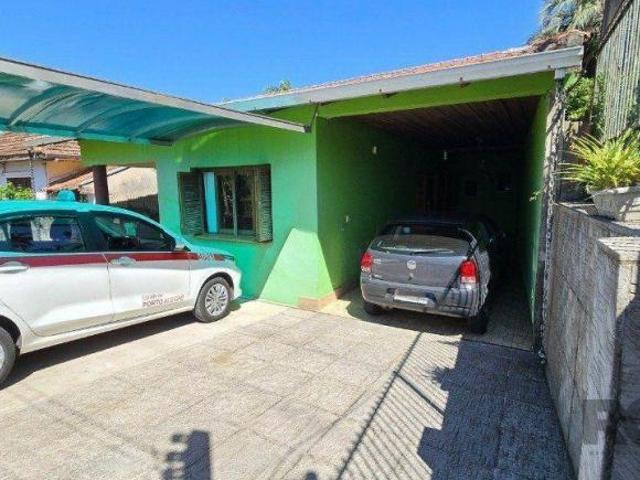 Casa com 161,25m², 3 dormitórios, 4 vagas no bairro Belém Novo