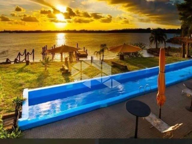 Casa com 180 m² 3 dormitórios à venda com acesso ao Guaíba