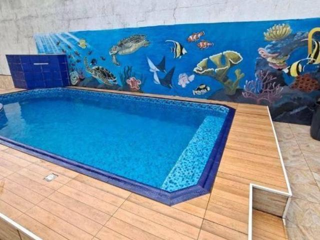 Casa com 1 dormitório à venda, 70 m² por R$ 385.000,00 Maracanã Praia Grande/SP