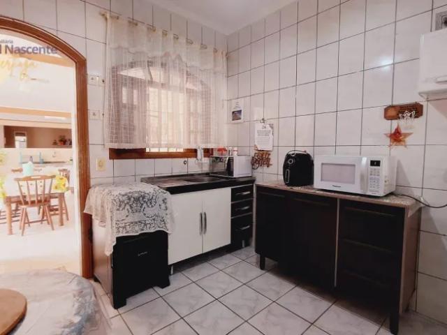 Casa com 2 dormitórios à venda, 160 m² Centro Bertioga/SP