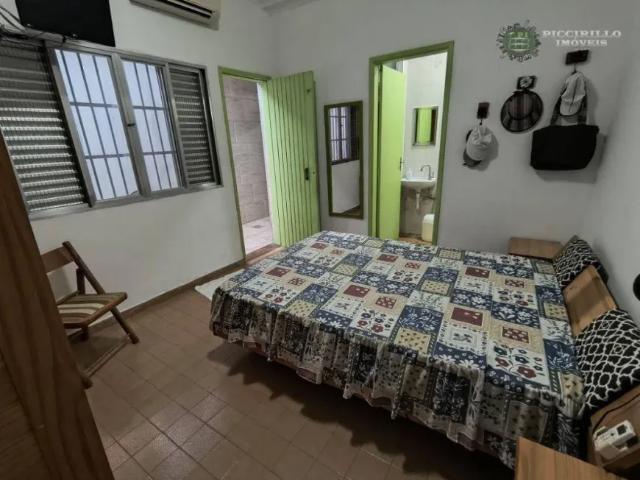 Casa com 2 dormitórios à venda, 115 m² por R$ 550.000,00 Vila Guilhermina Praia Grande/SP