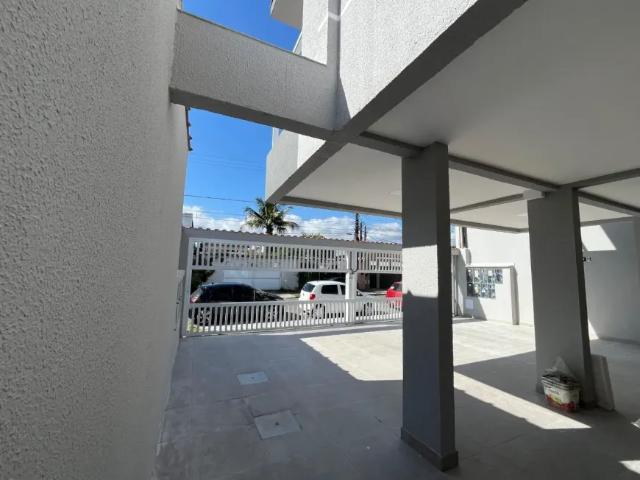 Casa com 2 dormitórios à venda, 56 m² por R$ 349.990,00 Vila Tupiri Praia Grande/SP