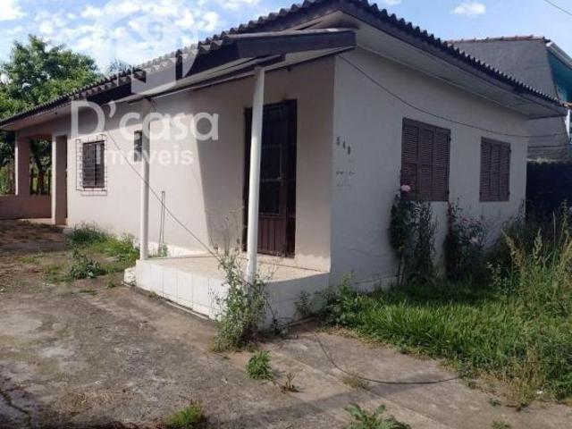 Casa com 2 dormitórios à venda por R$ 405.000,00 Vila Monte Carlo Cachoeirinha/RS