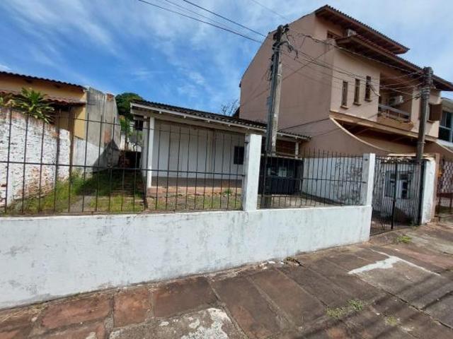 CASA COM 2 DORMITÓRIOS NA VILA NOVA EM TERRENO COM 300m²