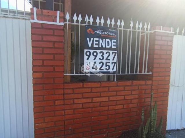 CASA COM 2 DORMITORIOS NO BAIRRO GUAJUVIRAS CANOAS