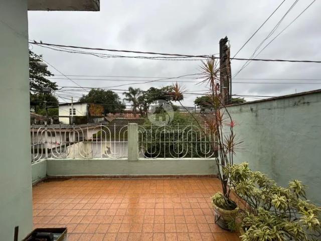 Casa com 2 dormitórios à venda, 117 m² por R$ 470.000,00 Macuco Santos/SP