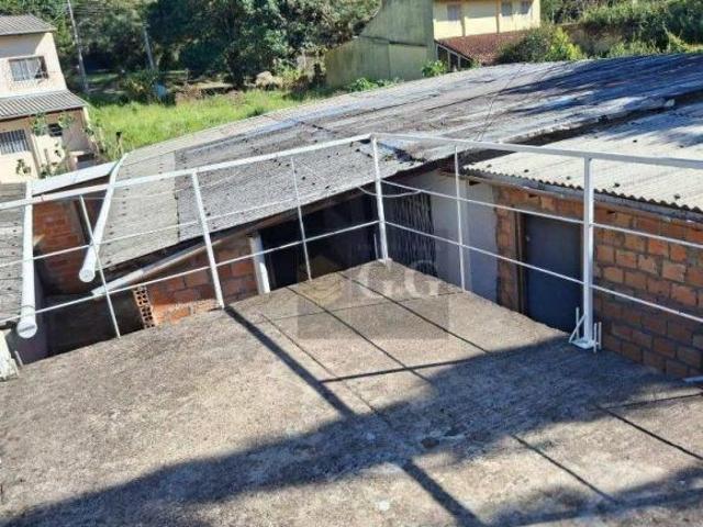 Casa com 2 dormitórios à venda, 110 m² por R$ 220.000 Centro Viamão/RS