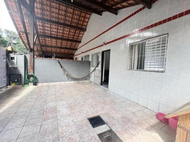 Casa com 2 dormitórios à venda, 112 m² por R$ 450.000,00 Tude Bastos Praia Grande/SP