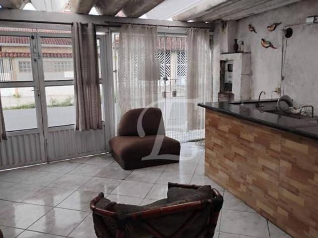 Casa com 2 dormitórios à venda, 125 m² por R$ 530.000,00 Aviação Praia Grande/SP