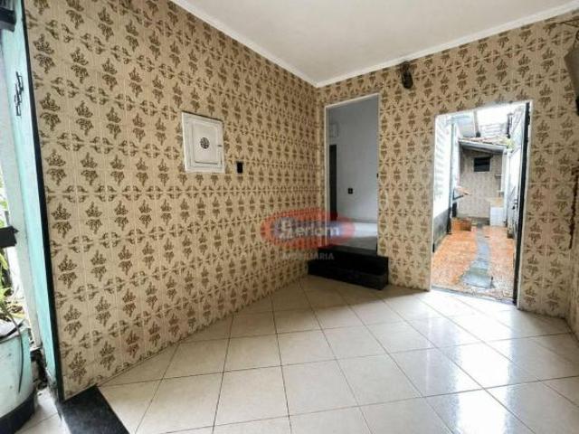 Casa com 2 dormitórios à venda, 125 m² por R$ 700.000,00 Aparecida Santos/SP