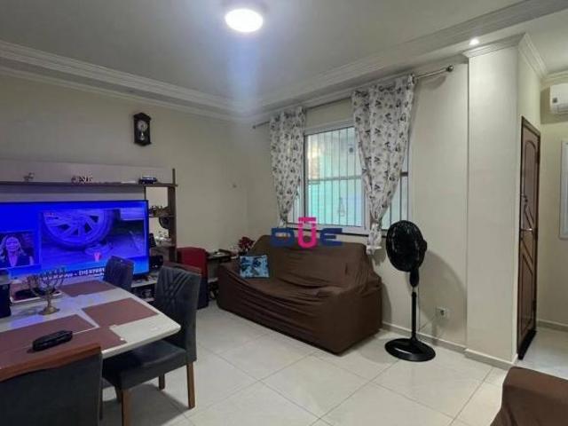 Casa com 2 dormitórios à venda, 135 m² por R$ 890.000 Aparecida Santos/SP