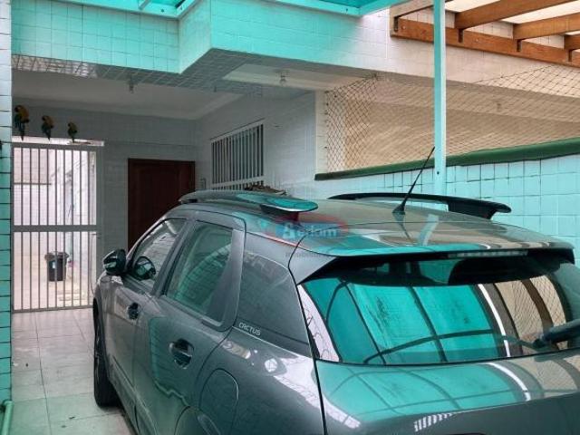 Casa com 2 dormitórios à venda, 139 m² por R$ 890.000,00 Aparecida Santos/SP