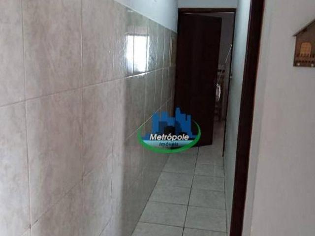 Casa com 2 dormitórios à venda, 170 m² por R$ 415.000,00 Vila Flórida Guarul