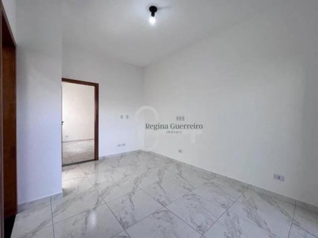 Casa com 2 dormitórios à venda, 50 m² por R$ 299.900,00 Estância São José Peruíbe/SP