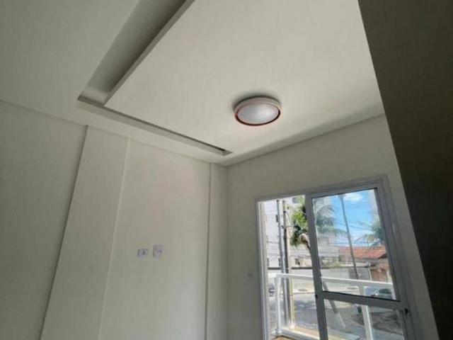 Casa com 2 dormitórios à venda, 52 m² por R$ 378.000 Vila Assunção Praia Grande/SP
