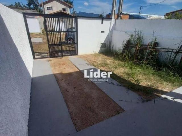 Casa com 2 dormitórios à venda, 57 m² por R$ 370.000,00 Balneário dos Golfinhos Caraguatatuba/SP