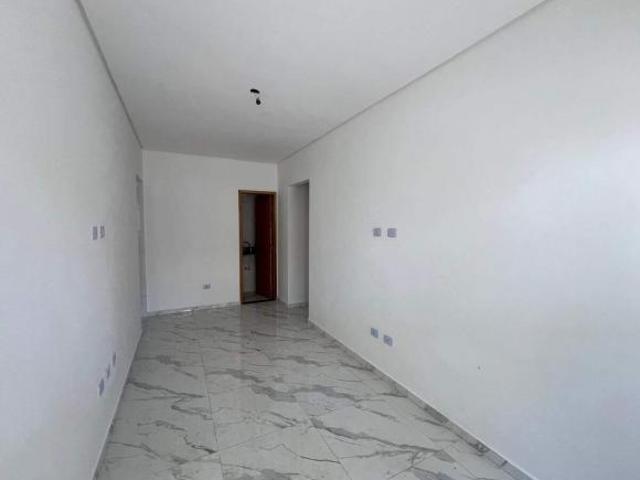 Casa com 2 dormitórios à venda, 59 m² por R$ 360.000,00 Tude Bastos Praia Grande/SP
