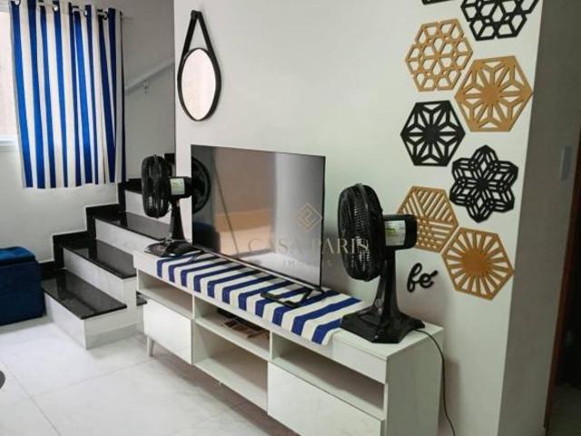 Casa com 2 dormitórios à venda, 59 m² por R$ 395.000,00 Aviação Praia Grande/SP