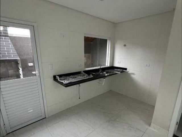 Casa com 2 dormitórios à venda, 60 m² por R$ 325.000,00 Aviação Praia Grande/SP