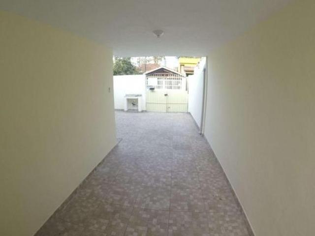 Casa com 2 dormitórios à venda, 68 m² por R$ 580.000,00 Boqueirão Praia Grande/SP