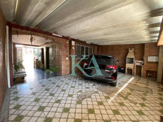 Casa com 2 dormitórios à venda, 72 m² por R$ 430.000 Aviação Praia Grande/SP