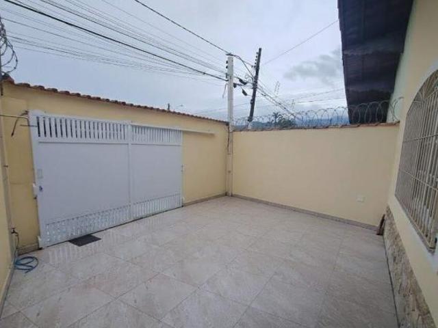 Casa com 2 dormitórios à venda, 77 m² por R$ 410.000,00 Caiçara Praia Grande/SP