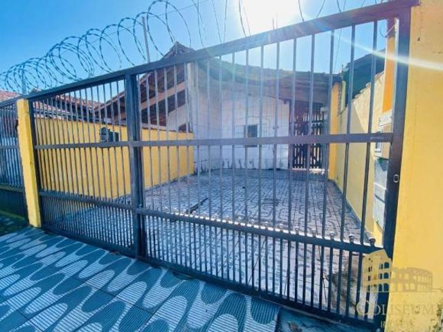 Casa com 2 dormitórios à venda, 82 m² por R$ 369.000 Vilamar Praia Grande/SP