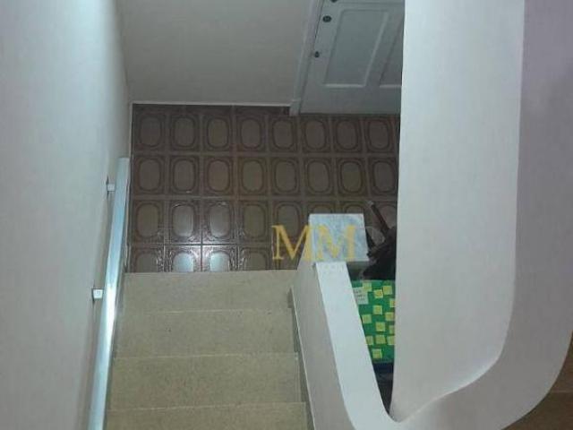 Casa com 2 dormitórios à venda, 87 m² por R$ 650.000,00 Ponta da Praia Santos/SP