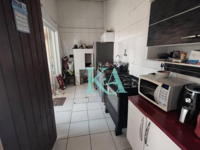 Casa com 2 dormitórios à venda, 87 m² por R$ 800.000,00 Boqueirão Praia Grande/SP