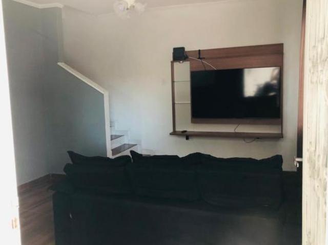 Casa com 2 dormitórios à venda, 90 m² por R$ 380.000 Aparecida Santos/SP
