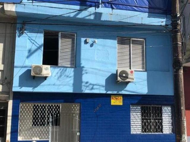 Casa com 2 dormitórios à venda, 90 m² por R$ 380.000,00 Aparecida Santos/SP