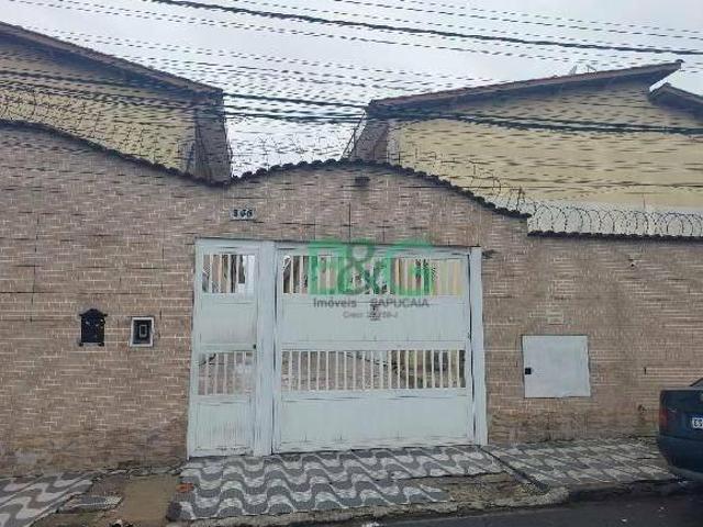 Casa com 2 dormitórios à venda, 92 m² por R$ 172.057,56 Jardim Anhangüera Praia Grande/SP