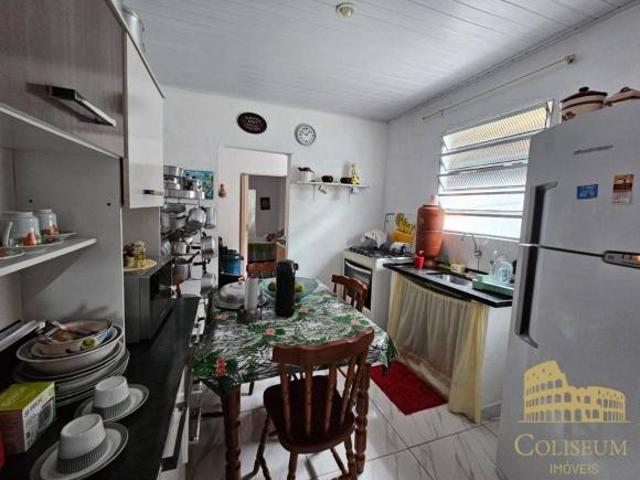 Casa com 2 dormitórios à venda, 93 m² por R$ 330.000,00 Vila Antártica Praia Grande/SP
