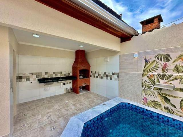 Casa com 2 dormitórios à venda, 94 m² por R$ 680.000,00 Caiçara. Praia Grande/SP
