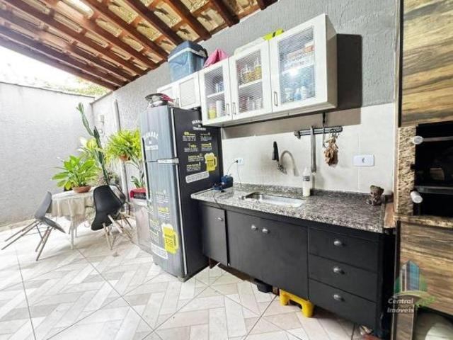 Casa com 2 dormitórios à venda, 99 m² por R$ 390.000,00 Tude Bastos Praia Grande/SP