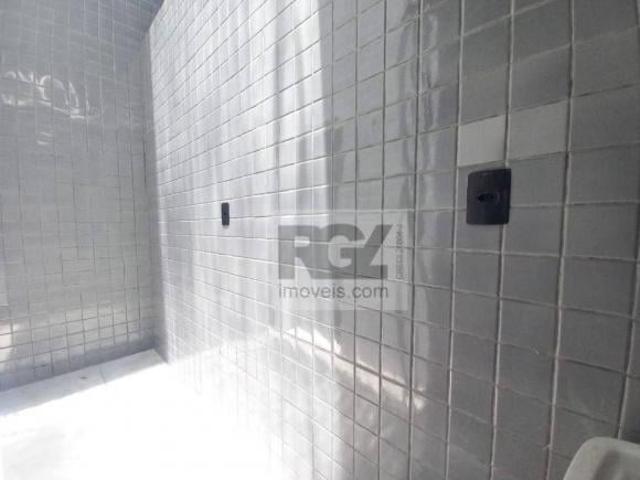 Casa com 2 dormitórios à venda por R$ 550.000,00 Macuco Santos/SP