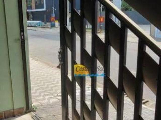 Casa com 2 dormitórios à venda por R$ 650.000,00 Boqueirão Praia Grande/SP