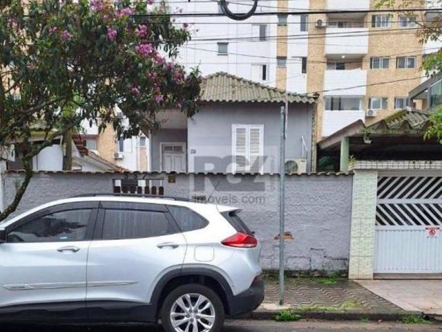 Casa com 2 dormitórios à venda por R$ 700.000,00 Ponta da Praia Santos/SP