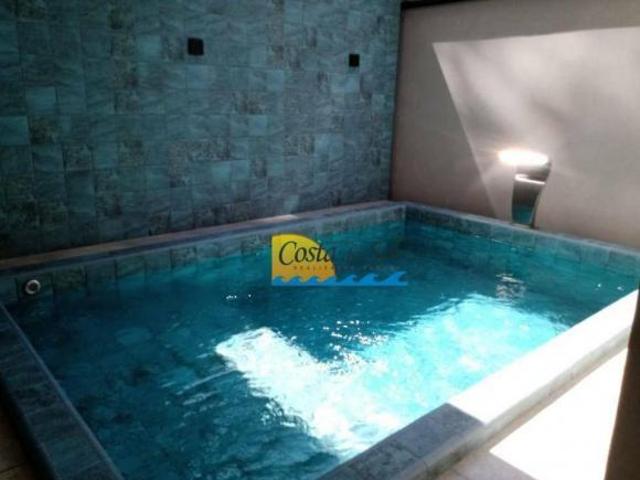 Casa com 2 dormitórios à venda por R$ 715.000,00 Canto do Forte Praia Grande/SP