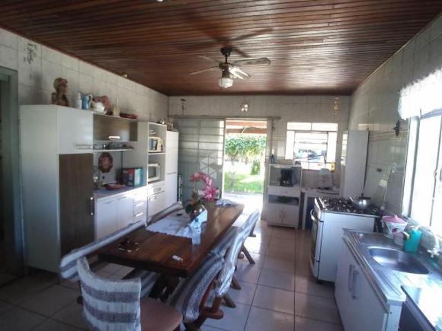Casa com 2 Dormitórios e Estrutura Comercial Oportunidade