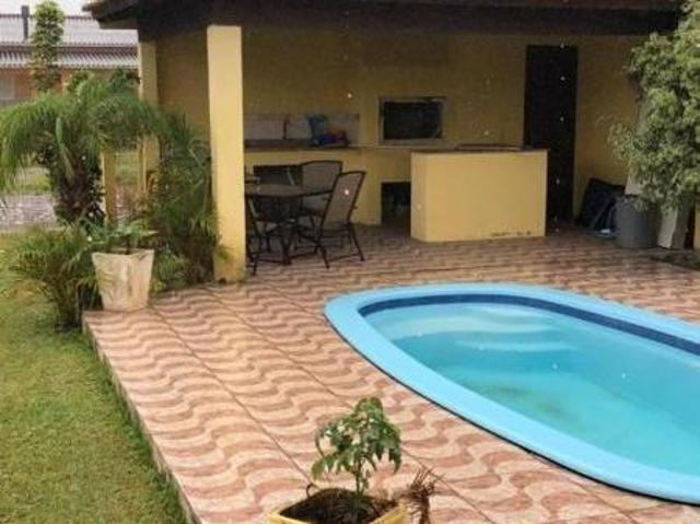 Casa com 2 Dormitórios e Piscina em Nova Tramandai