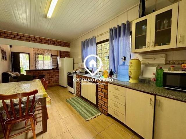 Casa com 2 dormitórios sendo um suíte à venda no bairro Lomba do Pinheiro em Porto Alegre/RS