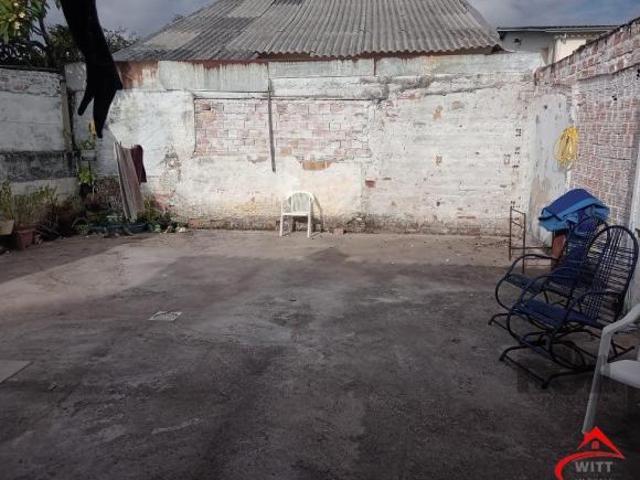 Casa com 2 dormitórios, vaga, amplo pátio, no bairro Santa Rosa de Lima, Poa/RS
